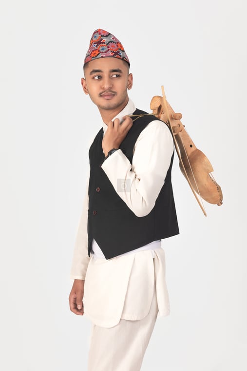 A Nepali Man traditionally dressed man with sarangi - Photos Nepal