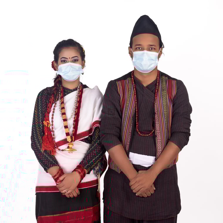 A Newari couple wearing a surgical mask - Photos Nepal