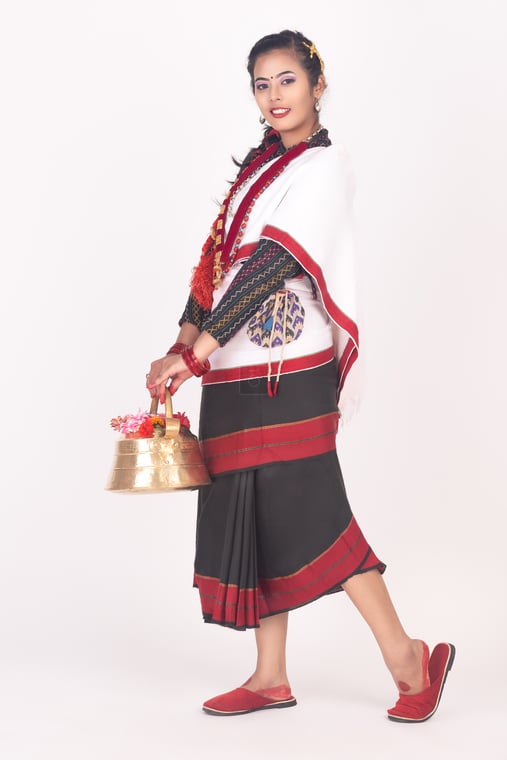 A Newari woman in Hakupatasi carrying a water pot - Photos Nepal