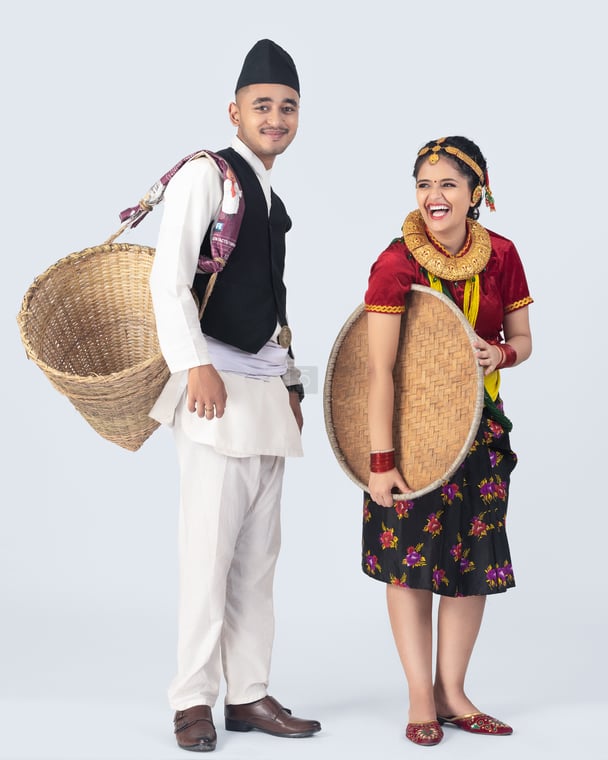 A traditionally dressed Nepalese couple laughing - Photos Nepal