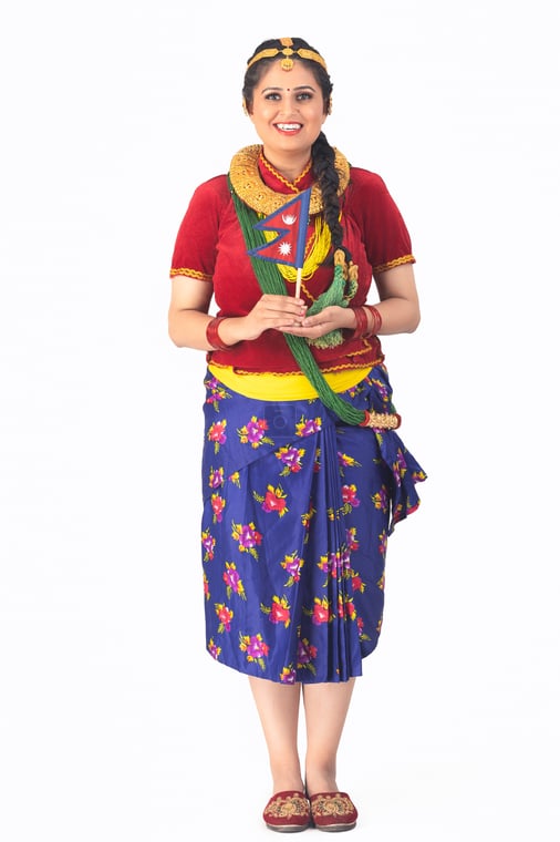 Traditionally dressed Nepali woman carrying a miniature flag - Photos Nepal