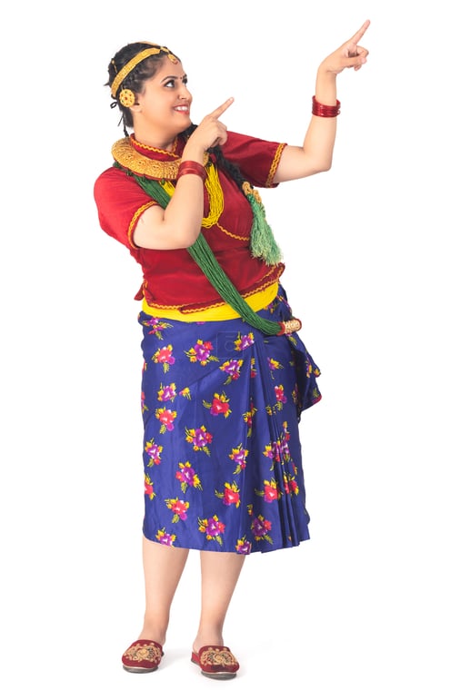Traditionally dressed Nepali woman pointing somewhere - Photos Nepal