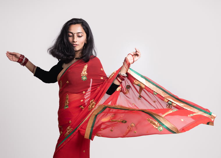 A beautiful girl in red saree dancing - Photos Nepal