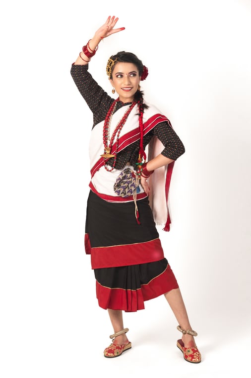 A beautiful Newari girl in dancing pose - Photos Nepal