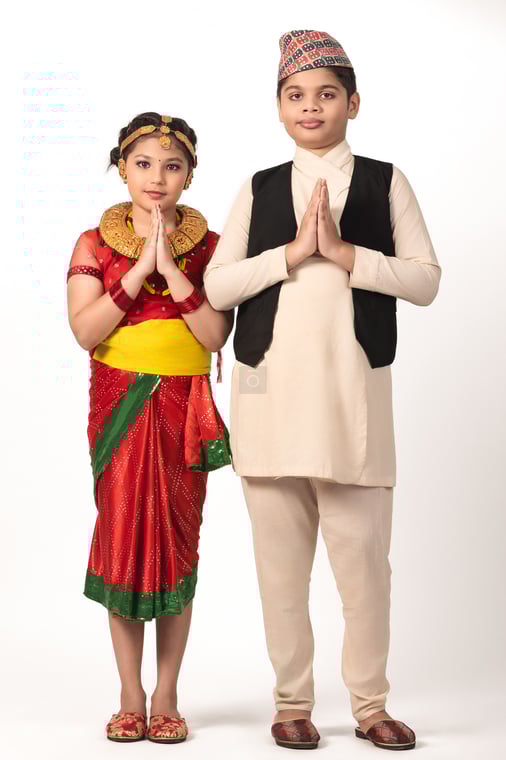 A boy and a girl doing namaste - Photos Nepal