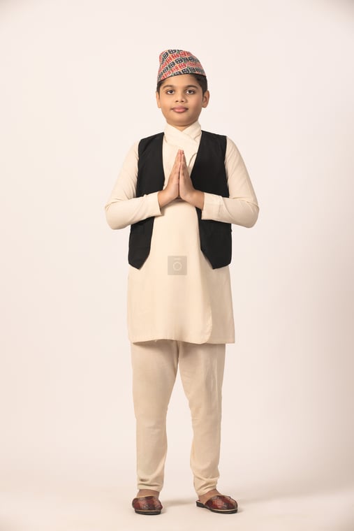 A boy doing namaste - Photos Nepal