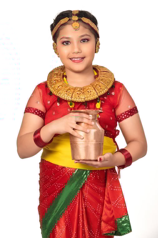 A Girl Carrying a Gagro - Photos Nepal