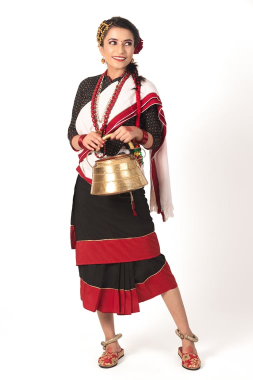 A Newari Girl carrying a water pot - Photos Nepal