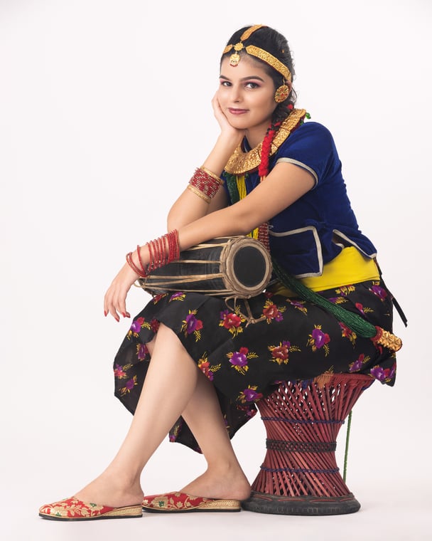 Girl wearing Nepali dress on muda - Photos Nepal