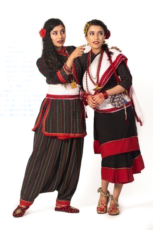 Two beautiful Newari girls look on - Photos Nepal