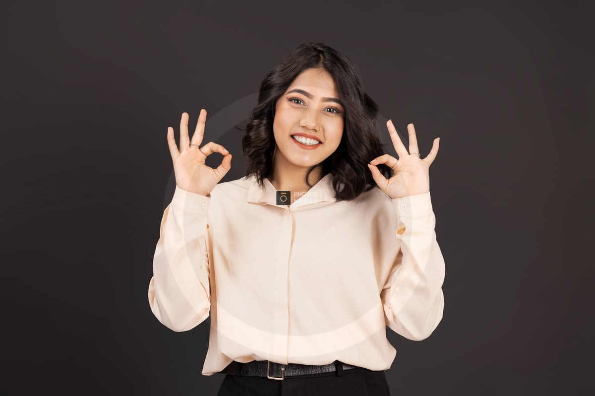 Cheerful Nepali Girl Attractive Female With Ok Sign Gesturing Approval cheerful-nepali-girl-attractive-female-with-ok-sign-gesturing-approval