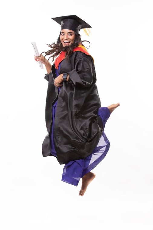 Joyful Nepali Graduated woman in a Graduation Gown Jumping - Photos Nepal