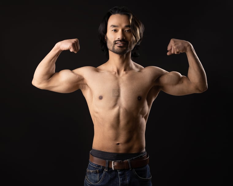 Shirtless Male Model Flexing Muscles in a Studio - Fitness Inspiration ...